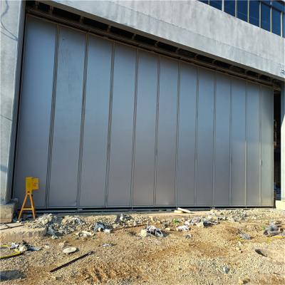 China Wind Resistant Thermal Insulated Folding Hangar Door Custom Widths Height Rated Grade for sale
