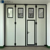 China Thermal Insulated Industrial Folding Door Rock Wool Filled Bi Parting Folding Gate for sale