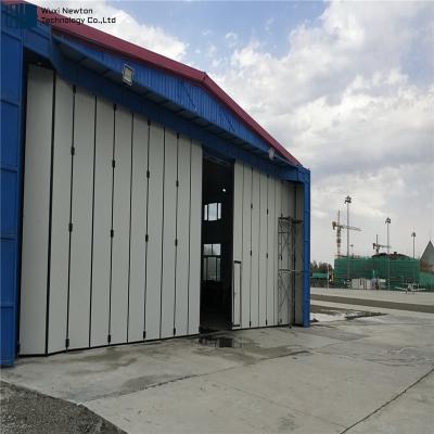 China Reinforced Frame Metal Industrial Folding Door Heavy Duty Motorized Operation Available for sale