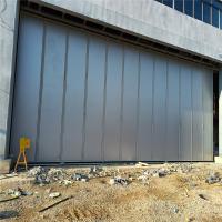 China Heavy Duty Multi Panel Aircraft Hangar Door Industrial Bifold Hangar Doors Space Saving for sale