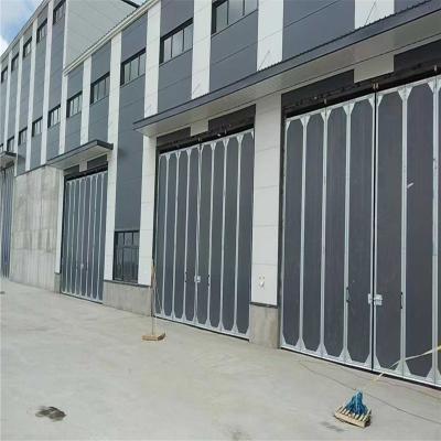 China Fully Customized Industrial Bifold Doors Wind Resistance Folding Steel Door for sale