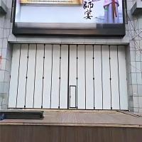 China OEM Metal Bi Folding Doors Windproof Exterior Industrial Doors Low Maintenance for sale