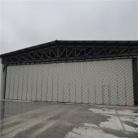 China OEM Metal Bi Folding Doors Windproof Exterior Industrial Doors Low Maintenance for sale