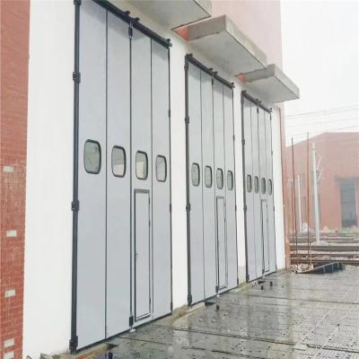 China Customizable Width Industrial Folding Door Heavy Duty Steel Bifold Door Powder Coated for sale