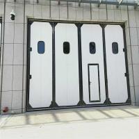 China Top Hung Industrial Folding Door Floor Track Free Bi Parting Folding Gate for sale