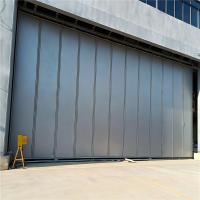 China Heavy Duty Weatherproofing Folding Hangar Door Vertical Bi Folding Aircraft Hangar Door for sale