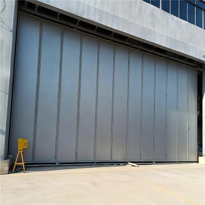 China Heavy Duty Weatherproofing Folding Hangar Door Vertical Bi Folding Aircraft Hangar Door for sale