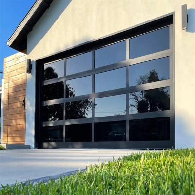 China 6063-T5 Aluminum 5mm Tempered Glass Transparent Garage Door Quiet Operation Custom Size for sale