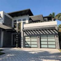 China Safe Compliant Glass Sectional Garage Door Wind Resistance Safety Protection for sale