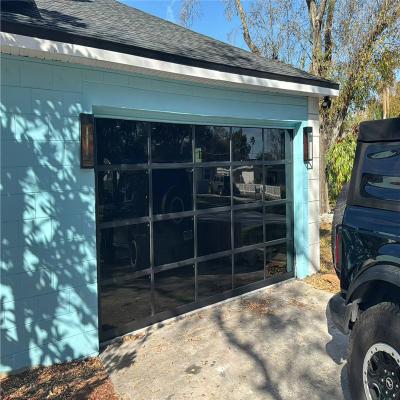 China 6063-T5 Aluminum Alloy Glass Garage Door Anti Oxidation Ultra Slim Frame Low Noise for sale