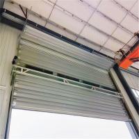 China Thermal Insulation Industrial Sectional Door Quiet Operation Steel For Warehouses for sale