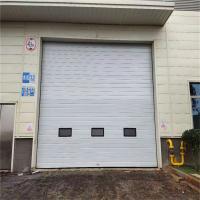 China Thermal Insulation Industrial Sectional Door Quiet Operation Steel For Warehouses for sale