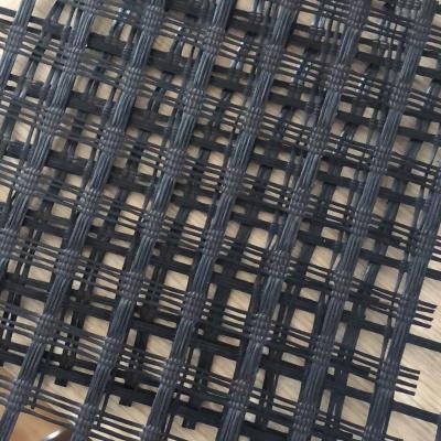 China Asphalt Reinforcement Fiberglass Geogrid Anti Crack Road Mesh Solution for sale