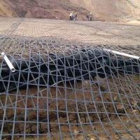 China Bitumen Coated Fiberglass Geogrid Pavement Crack Control Reinforcement Mesh for sale