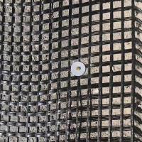 China Bitumen Coated Fiberglass Geogrid Pavement Crack Control Reinforcement Mesh for sale