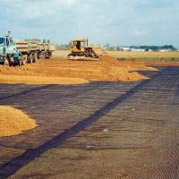 China High Strength Low Creep Asphalt Reinforcement Fiberglass Geogrid Road Construction Material for sale