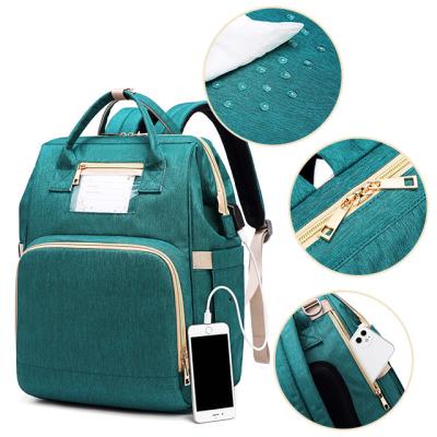 China New Portable Folding Crib Mom Bag Out Portable Multi-functional Shoulder Mother and Baby Bag baby diaper bag for sale