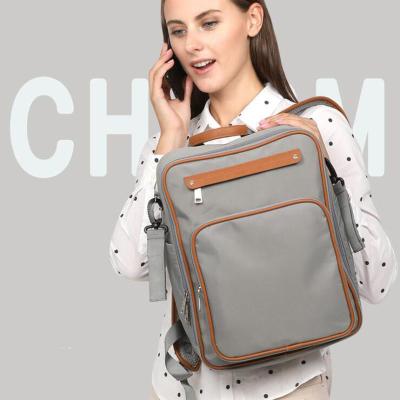 China Multifunctional Baby Bag Waterproof Travel Backpack Business Shell Mummy Diaper Bag With Stroller Strap For Mom&Dad for sale