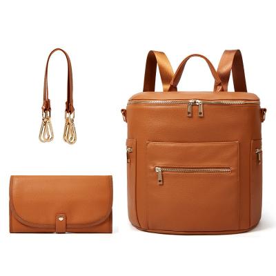 China OEM ODM Travel PU Leather Backpack Diaper Bags 31*18*33cm for sale