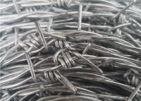 China 25kg Roll Galvanized Steel Cyclone Barbed Wire For Electro Fencing for sale