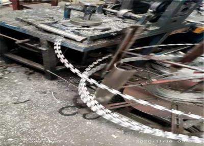 China Hot Dipped Galvanized 23 Loops 0.6mm Razor Wire Concertina for sale