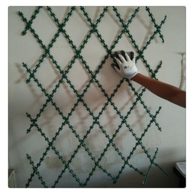 China Welded Barbed Mesh 1x2 Razor Panel For Fence Protect for sale
