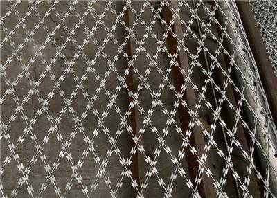 China Hot Dipped Galvanized Welded BTO18 Razor Wire Mesh 100mm*100mm Aperture for sale