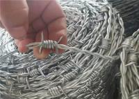 China 13.5 Gauge Barbed Farm Fence 0.086mm Razor Wire Concertina High Strength Galvanized for sale
