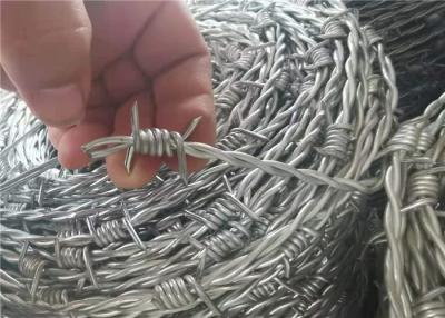 China 13.5 Gauge Barbed Farm Fence 0.086mm Razor Wire Concertina High Strength Galvanized for sale