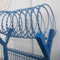 China Security Product 500mm Barbed Tape Concertina Wire 10kg Bto-22 Rust Residence for sale
