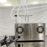 China Desktop Small Bottle Filling Machine Double Head Plastic Ampoule Filling Machine for sale