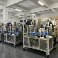 China Automatic Two Heads Toner Rotary Servo Liquid Cream Filling Capping Machine for sale