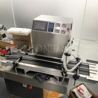 China Small 4 Head Liquid Filling Machines Electric With Conveyor Belt for sale