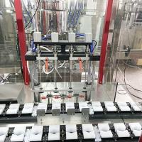 China Custom Four Nozzle Cream Filling Machine Liquid Cycle Filling Line for sale