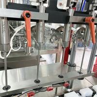 China Custom Four Nozzle Cream Filling Machine Liquid Cycle Filling Line for sale