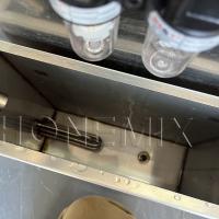 China Cosmetic Heated Balm Filling Machine Semi Auto Vertical Filling Machine for sale
