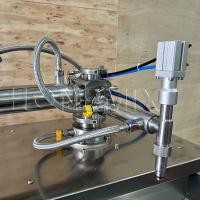 China Temperature Control Hair Wax Hot Cream Filling Machine Self Suction Filler for sale