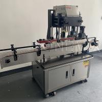China Four Wheels Automatic Capping Equipment Round Bottle Cap Sealing Machine for sale