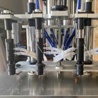 China Liquid Perfume Making Equipment Four Heads Automatic Perfume Filling Machine for sale