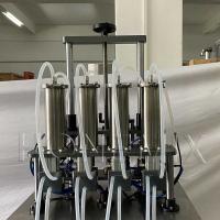 China Semi Auto Perfume Making Machine Four Heads Vacuum Filling Machine for sale