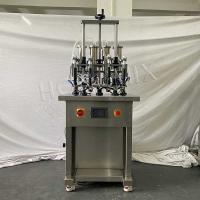 China Semi Auto Perfume Making Machine Four Heads Vacuum Filling Machine for sale