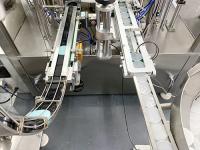 China Automatic Cosmetic Cream Filling Machine Rotary Bottle Filling Machine for sale