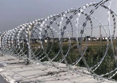 China Hot Dipped Galvanized Concertina Razor Wire Mesh Fence BTO-22 900mm Coil Diameter for sale