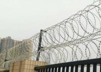 China Hot Dipped Galvanized Concertina Razor Wire Mesh Fence BTO-22 900mm Coil Diameter for sale