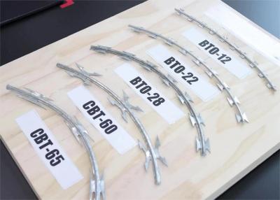 China Zinc Coated Concertina Razor Wire 0.5mm Blade 2.5mm Core Anti Climb Security Coil for sale