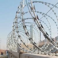China Hot Dipped Galvanized Concertina Razor Wire Coil 450mm 33 Loops Security Fence for sale