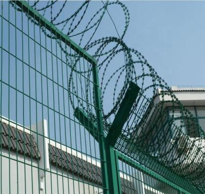 China Hot Dipped Galvanized Concertina Razor Wire BTO-22 Security Fence 500mm Coil for sale
