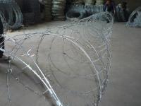 China Hot Dipped Galvanized BTO-22 Concertina Razor Wire Coil 450mm 33 Loops Security Fence for sale