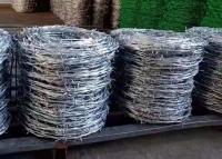 China Galvanized Barbed Wire Fence 75mm-120mm Barb Spacing 1.5mm-2.5mm Wire Diameter for Farm Security for sale