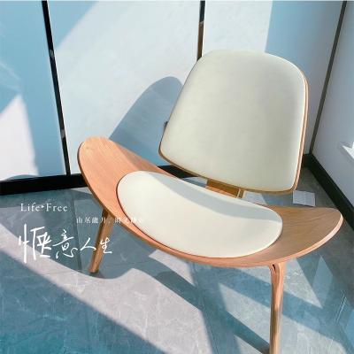 China Balcony Nordic Smile Shell Lounge Chair 1 Seater Backrest Airplane Chair Modern Design for sale